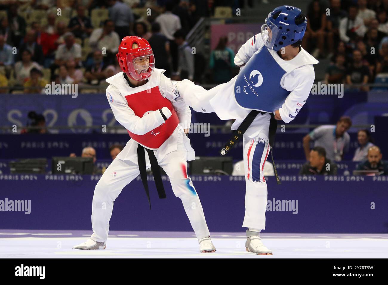 Thanwa KAENKHAM of Thailand (blue) vs Bopha KONG of France (red) in the ...