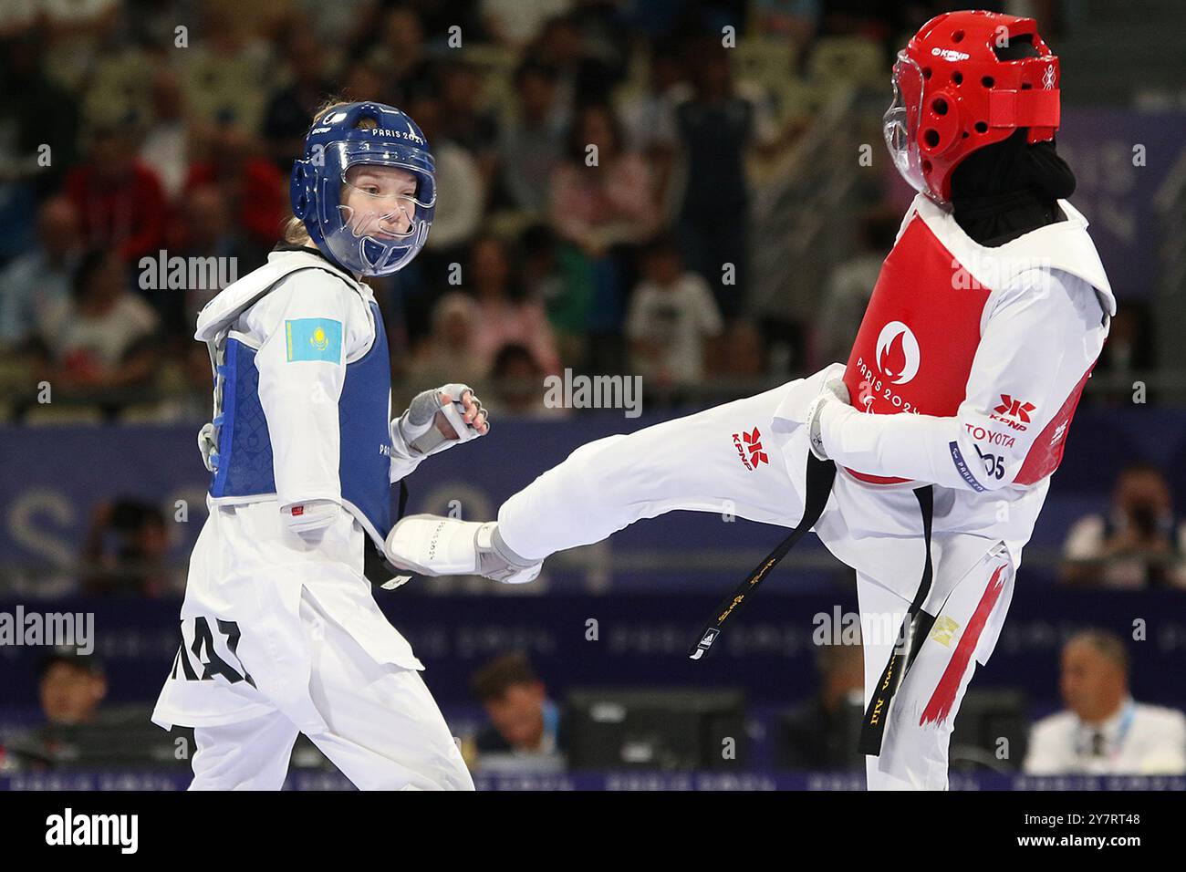 Milana KRASSAVTSEVA of Kazakhstan (blue) vs Salma ALI ABD AL MONEEM ...