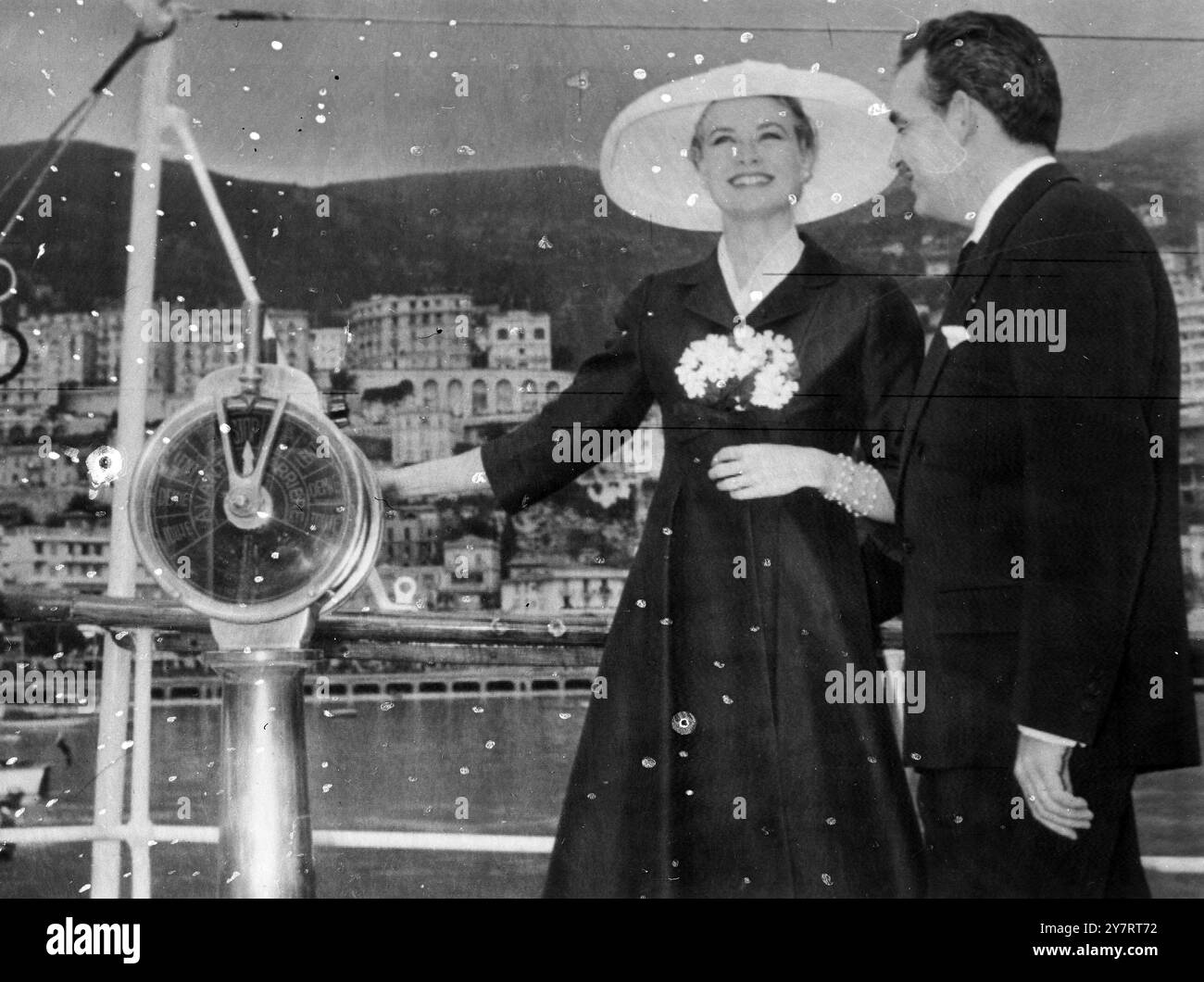 GRACE AND HER PRINCE ABOARD DEO JUVANTE IIGrace Kelly smiles happily as ...