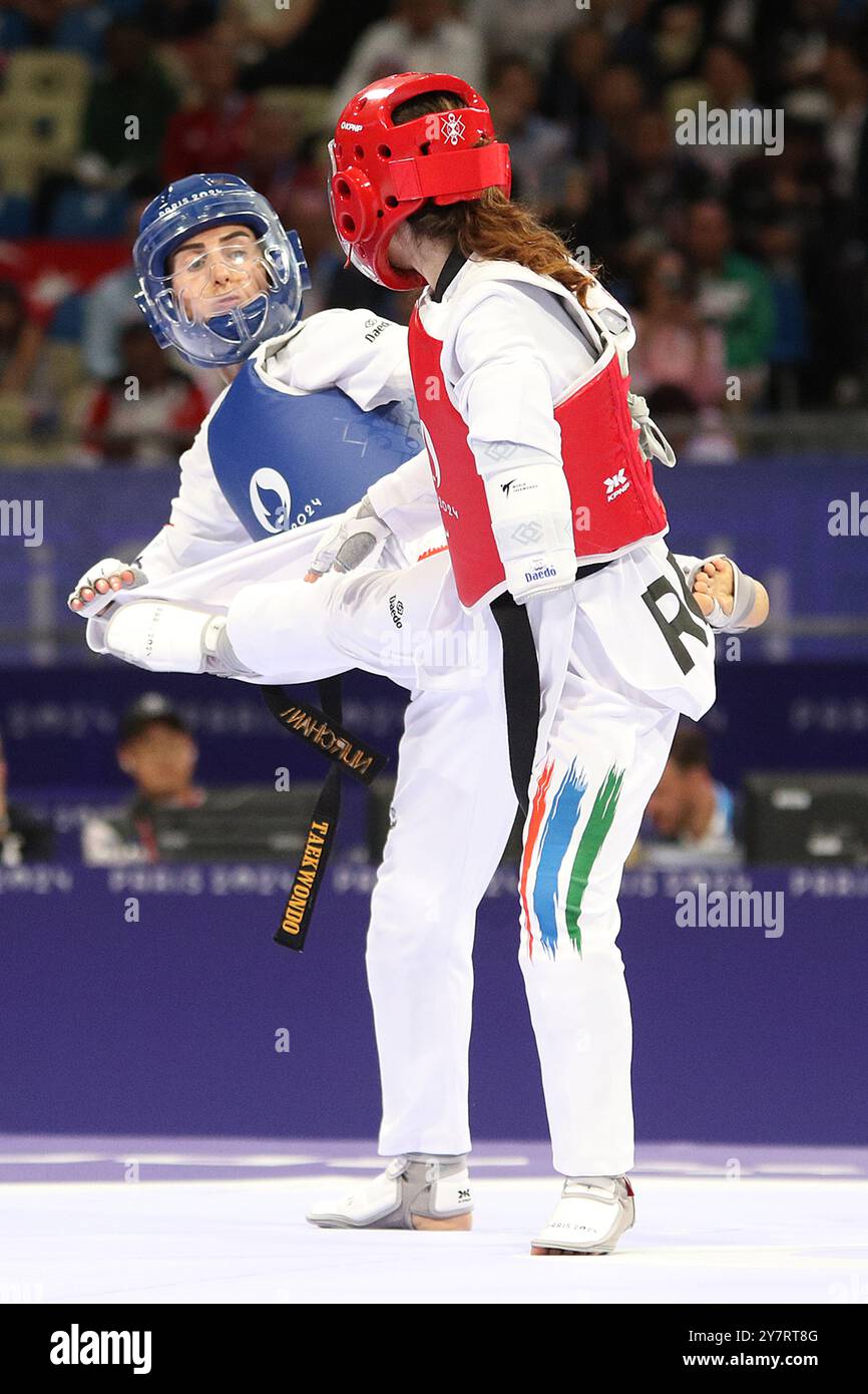 Nurcihan EKINCI of Turkey (blue) vs Zakia KHUDADADI (red) of the ...