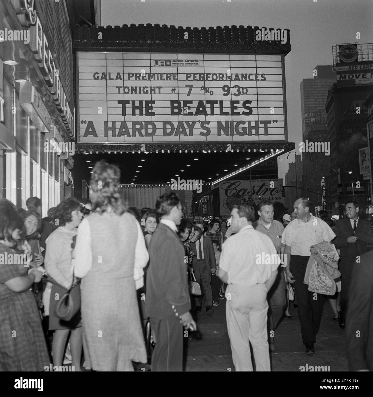 BEATLE FANS GATHER IN FRONT OF THE ASTOR THEATRE ON BROADWAY AND 45TH ...