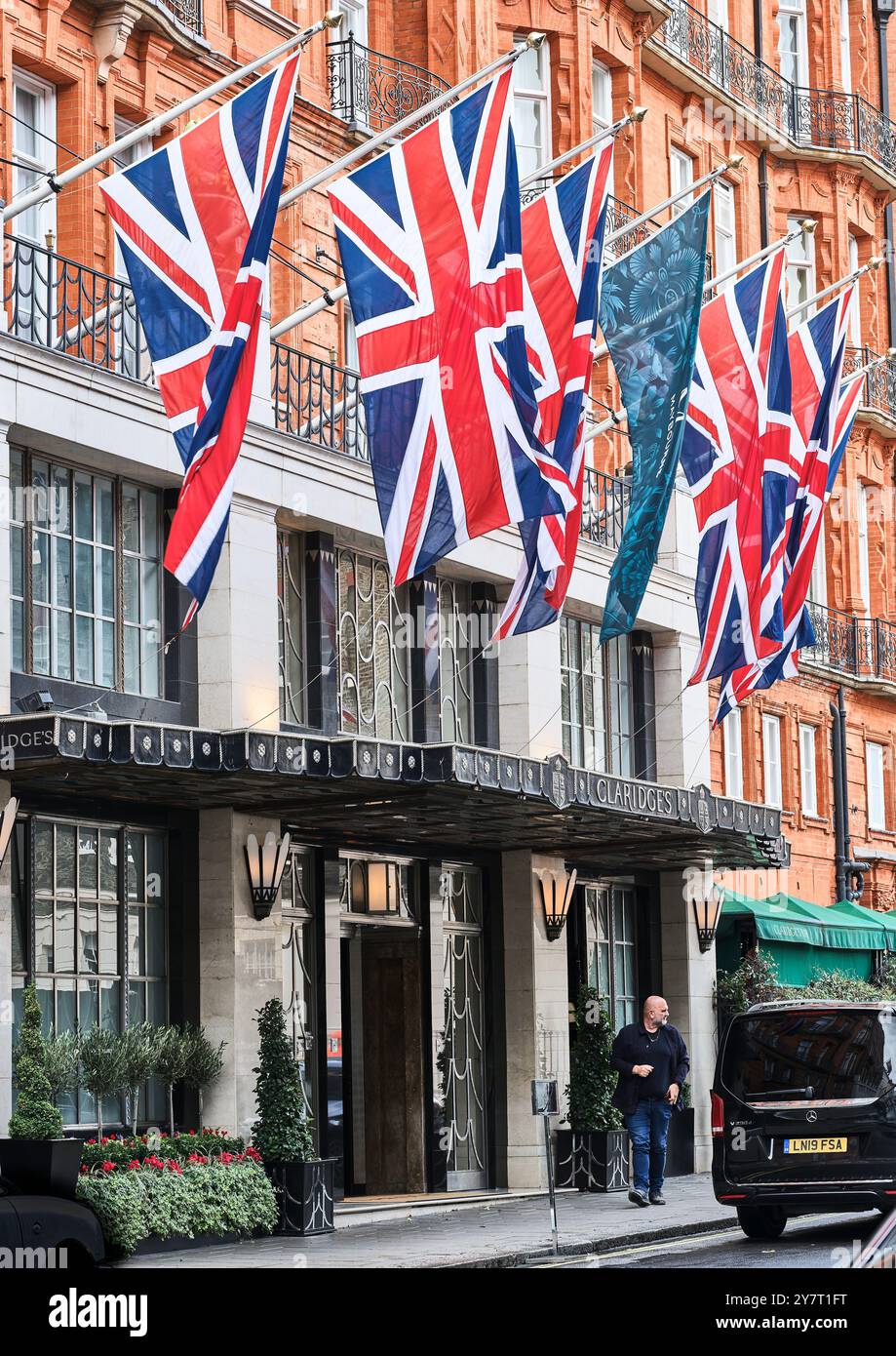 Union Jack flags outside the main entrance to Claridge's Hotel, Mayfair ...