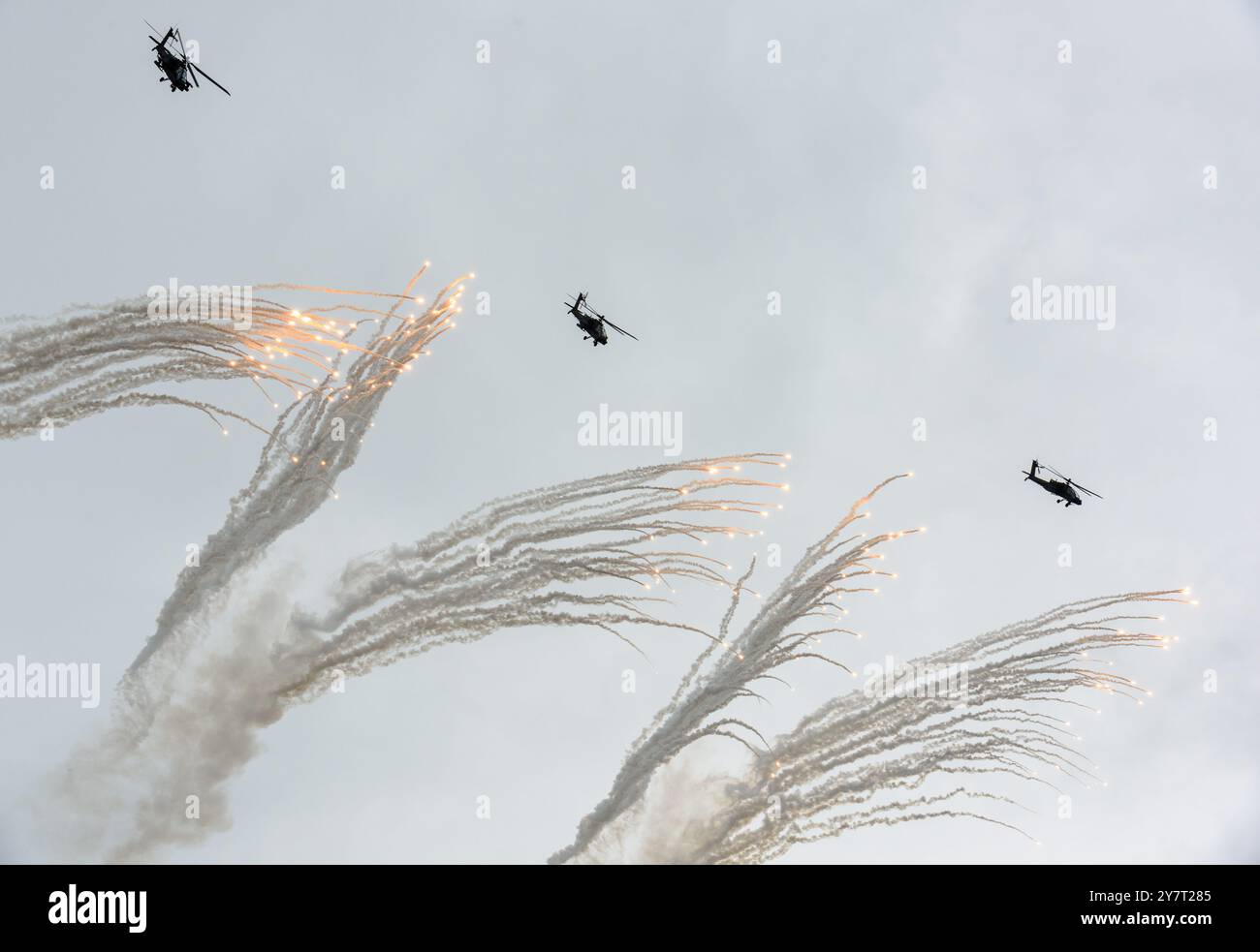 South Korean Army AH-64 Apache attack helicopters spraying flares ...