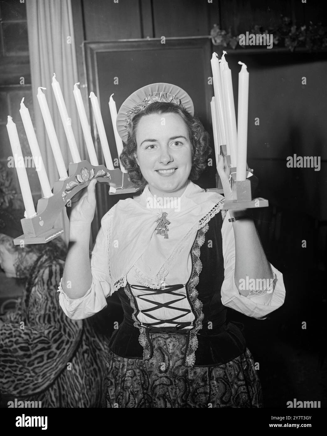 BURDEN IS LIGHT AT THE FAIR Making a light of London's December gloom ...