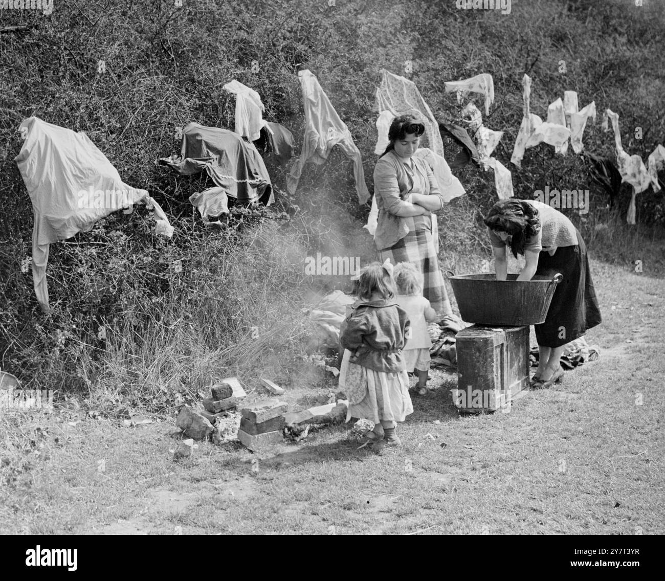 Clothes washing day at this Roma neighborhood. In a tradition going ...