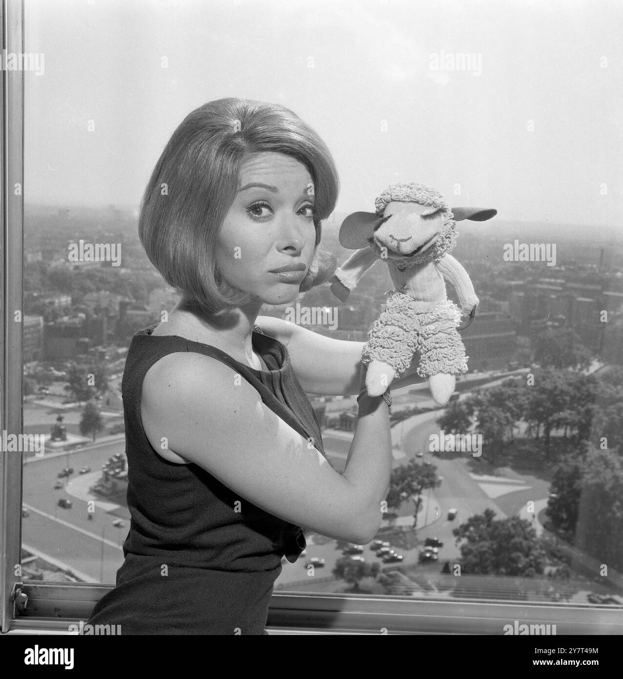 American artist Shari Lewis is pictured showing her glove puppet " Lamb ...