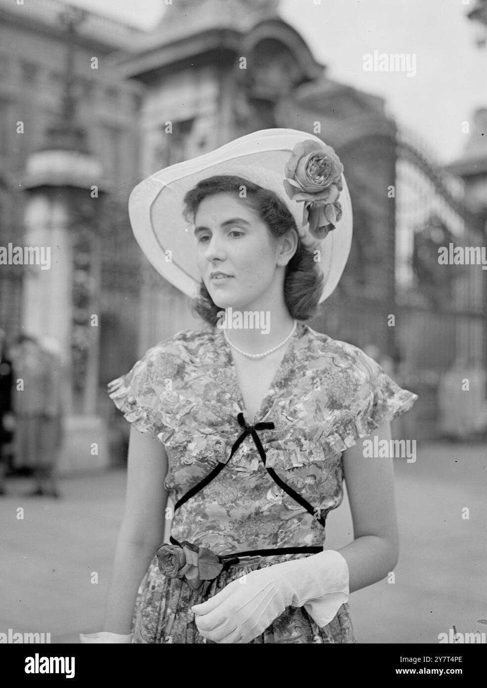 GUEST AT PRESENTATION PARTY Hat fashion worn by Miss ELIZABETH HOPPER ...