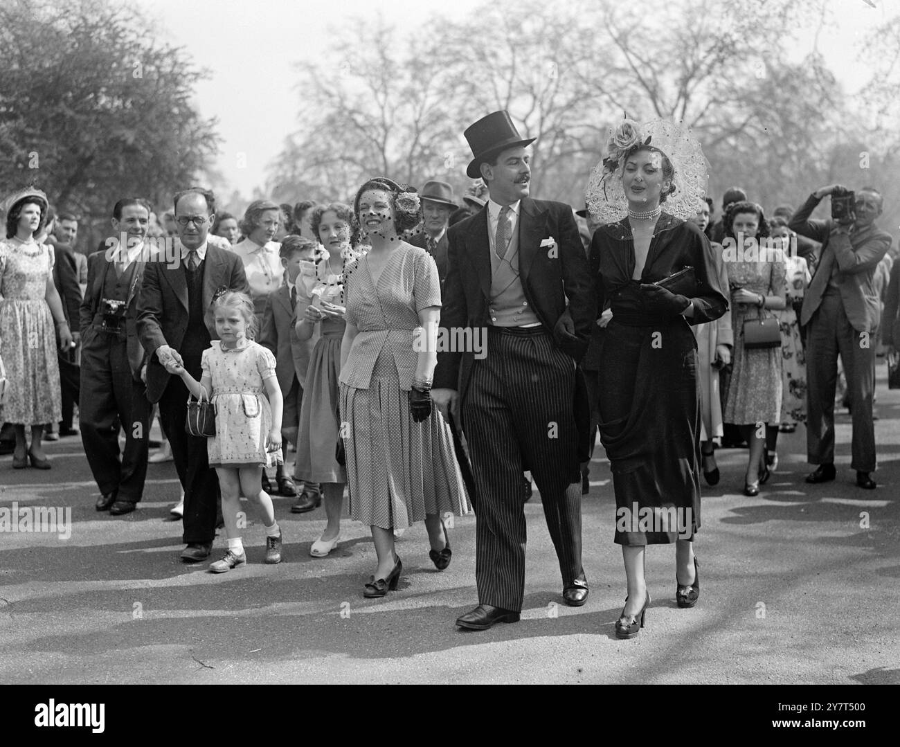 STROLLING IN THE EASTER PARADE - - - - With brilliant sunshine to add ...