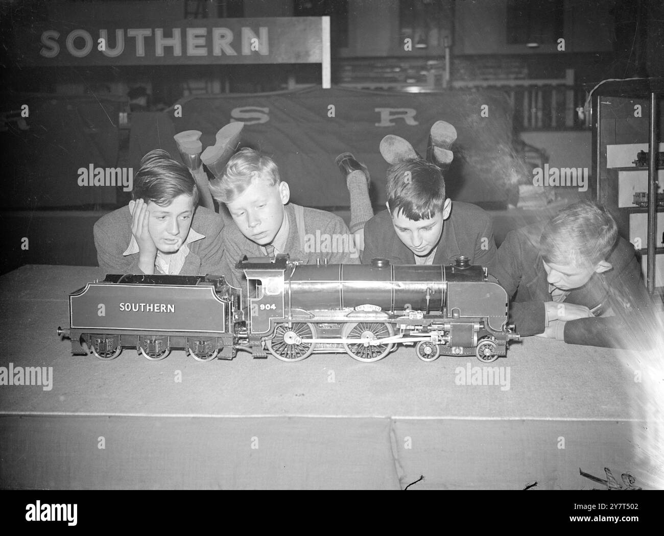 Technical Inspection Three youthful "experts" fascinated by a ...