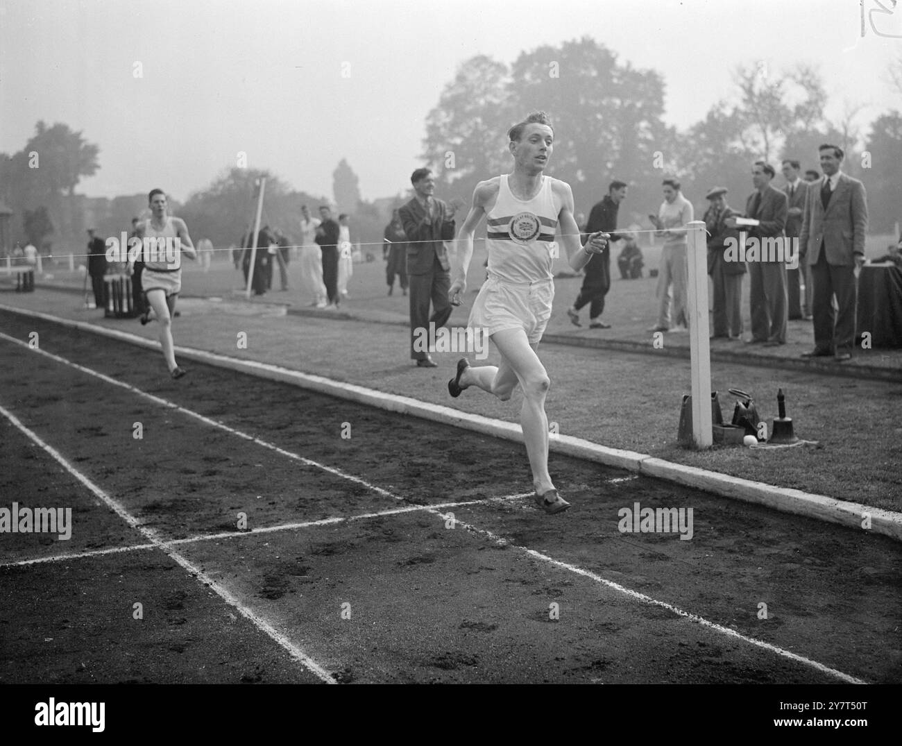 Winning by a mile Black and White Stock Photos & Images - Alamy