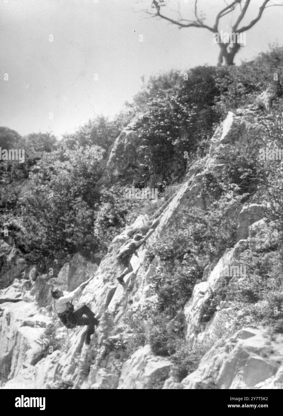 Climbing over ledge hi-res stock photography and images - Alamy