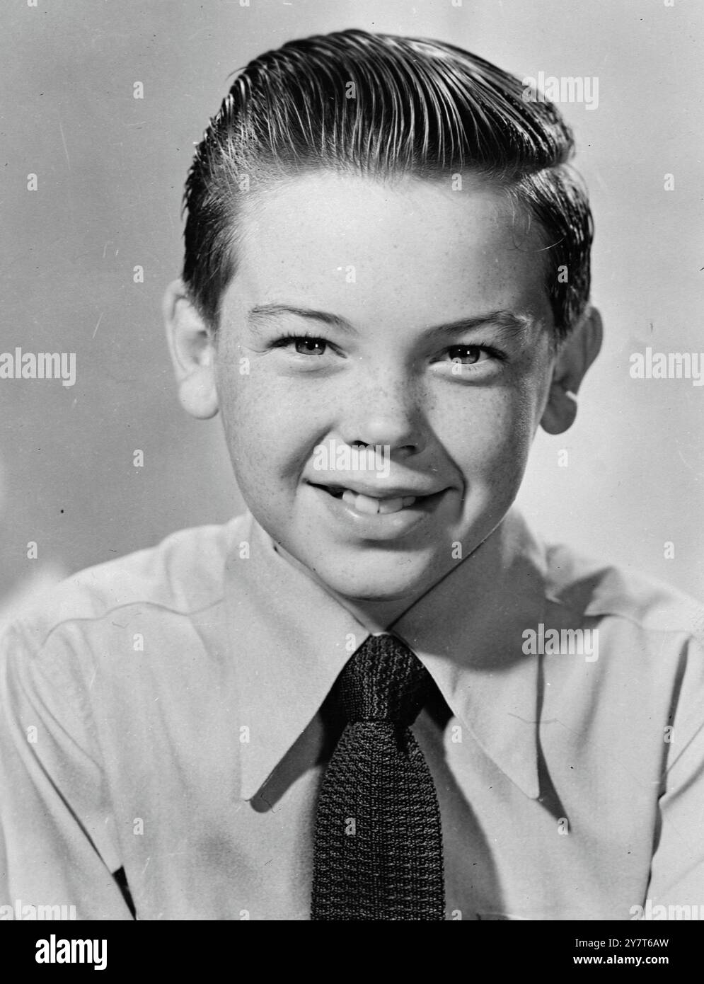 DISNEY'S PARTY BOY This smiling schoolboy is 13-year-old Hollywood actor Bobby Driscoll, who is ...