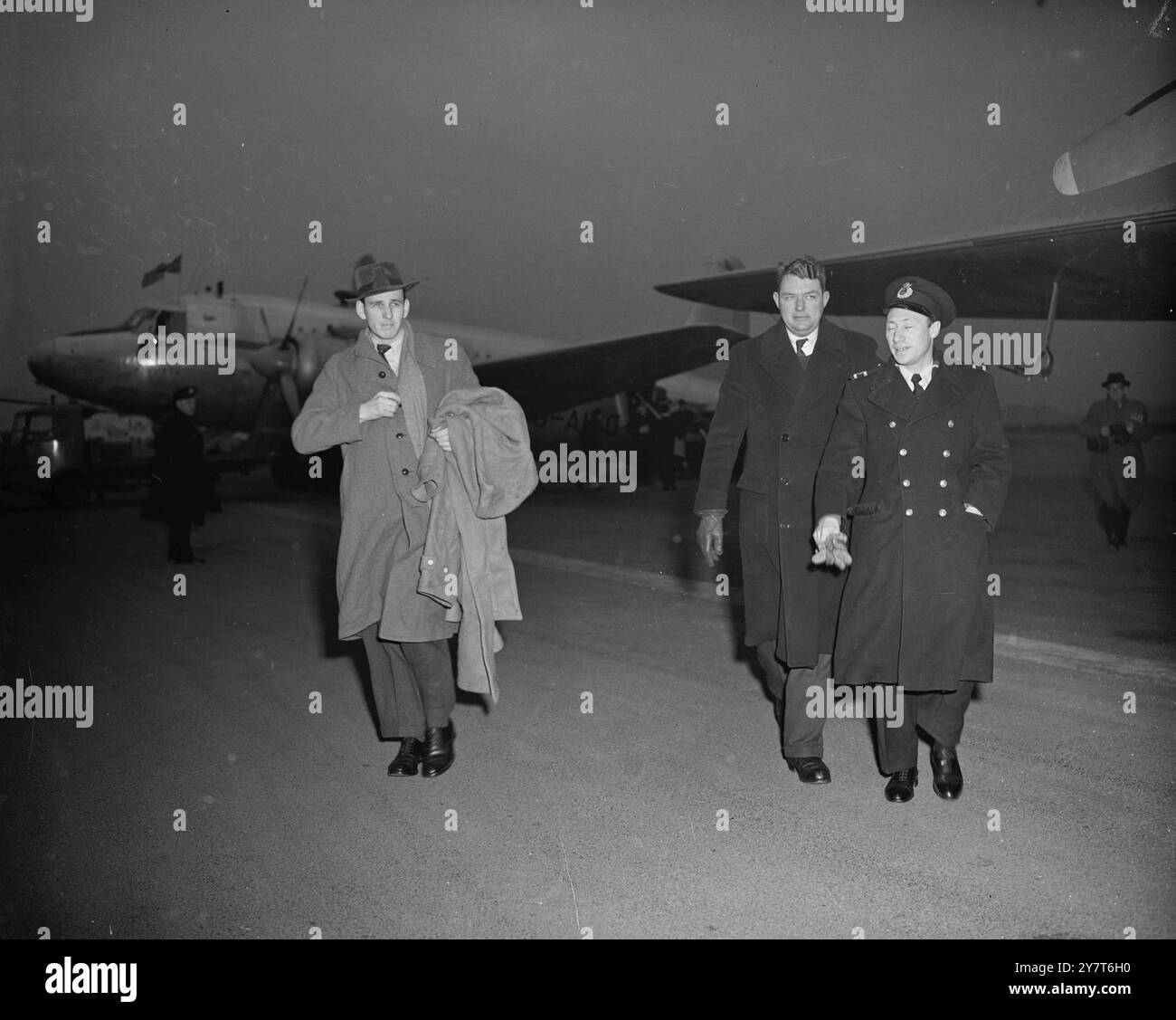 BRITONS RELEASED FROM POLISH GAOL ARRIVE HOME Henry Upperton and Gordon ...
