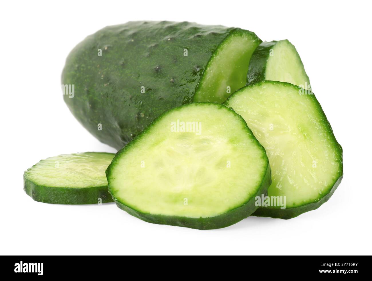 Pieces of fresh cucumber isolated on white Stock Photo - Alamy