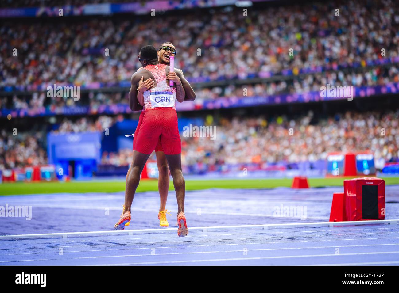 Aaron Brown and Andre De Grasse celebrating her medal in the 4x100 ...