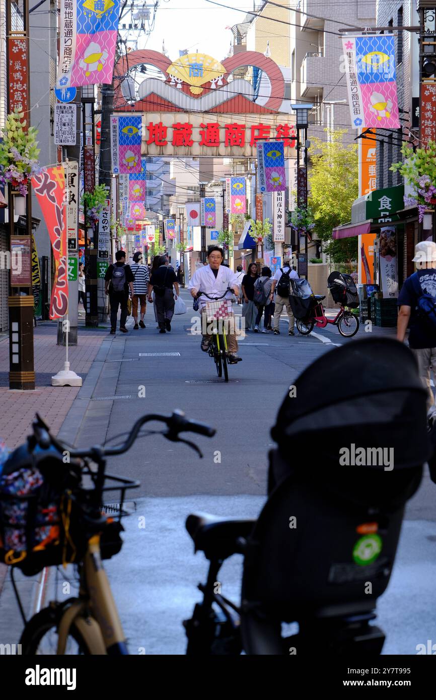 Street gate of Sugamo Jizou-dori Shopping Street with street name on it ...