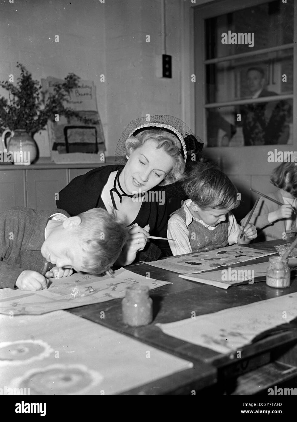 ANNE MAKES A CHECK 13 May 1950 To check whether her film views work out ...