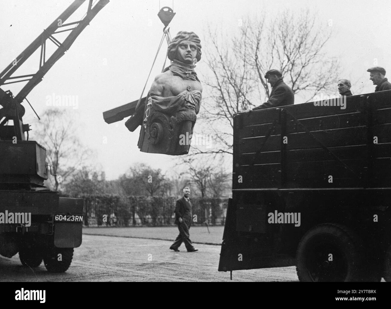 LIFT TO VALHALLA 10 April 1950 Dangling at the end of a crane, a new ...
