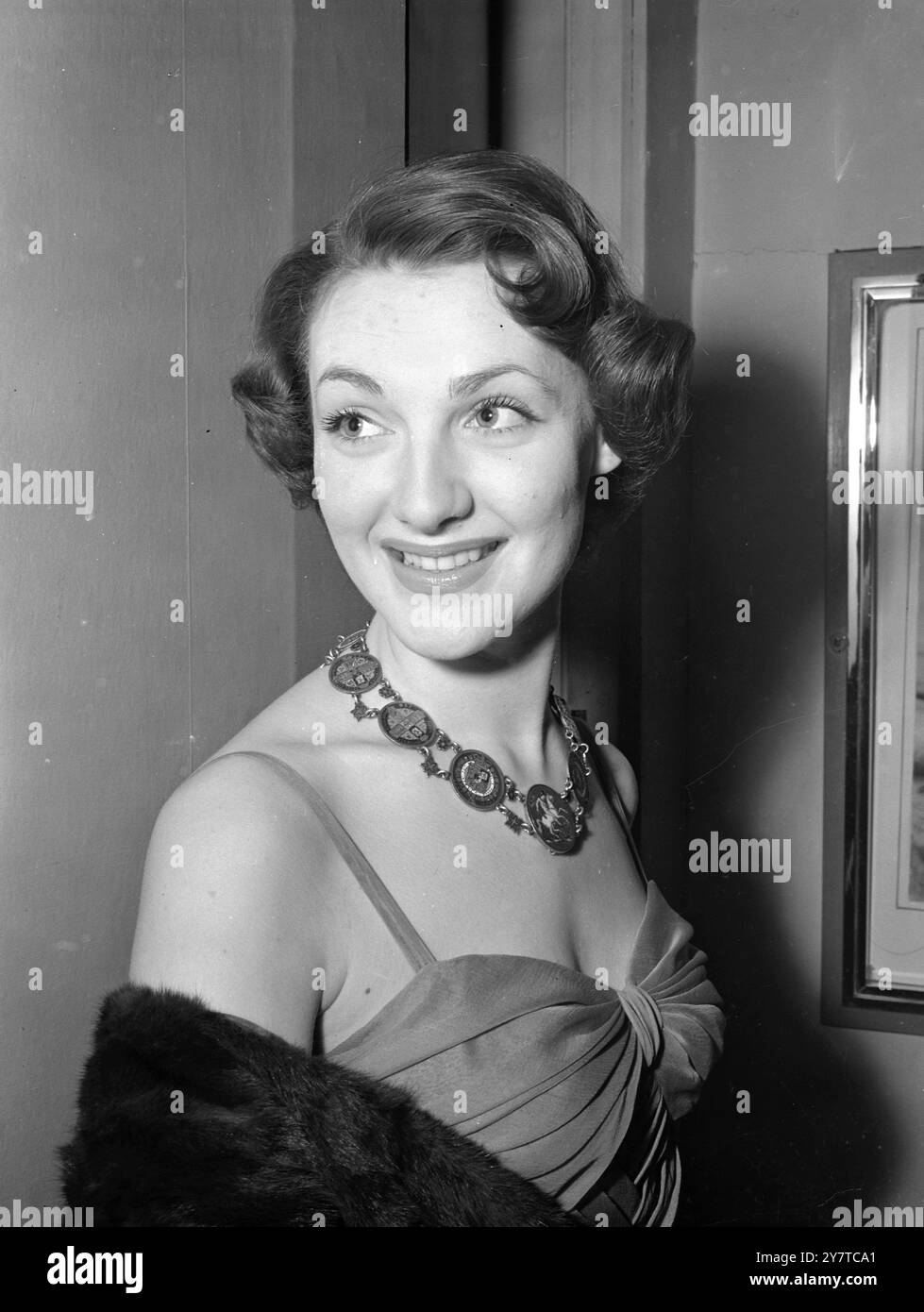 Neckless of the enamelled coins worn by film actress Barbara Murray ...