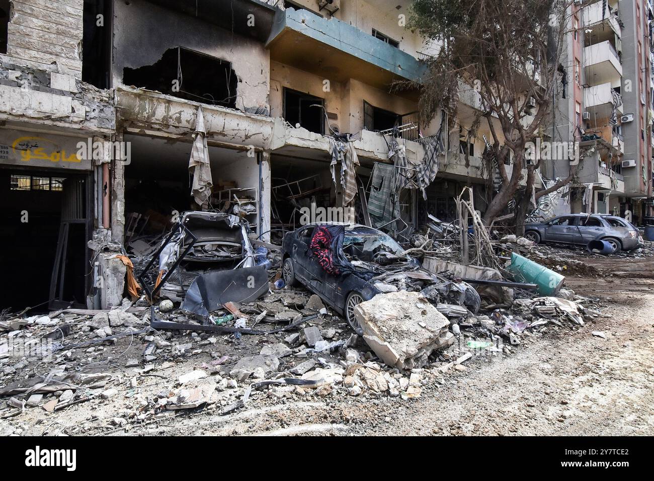 Beirut, Lebanon. 01st Oct, 2024. A view of damaged buildings and cars ...