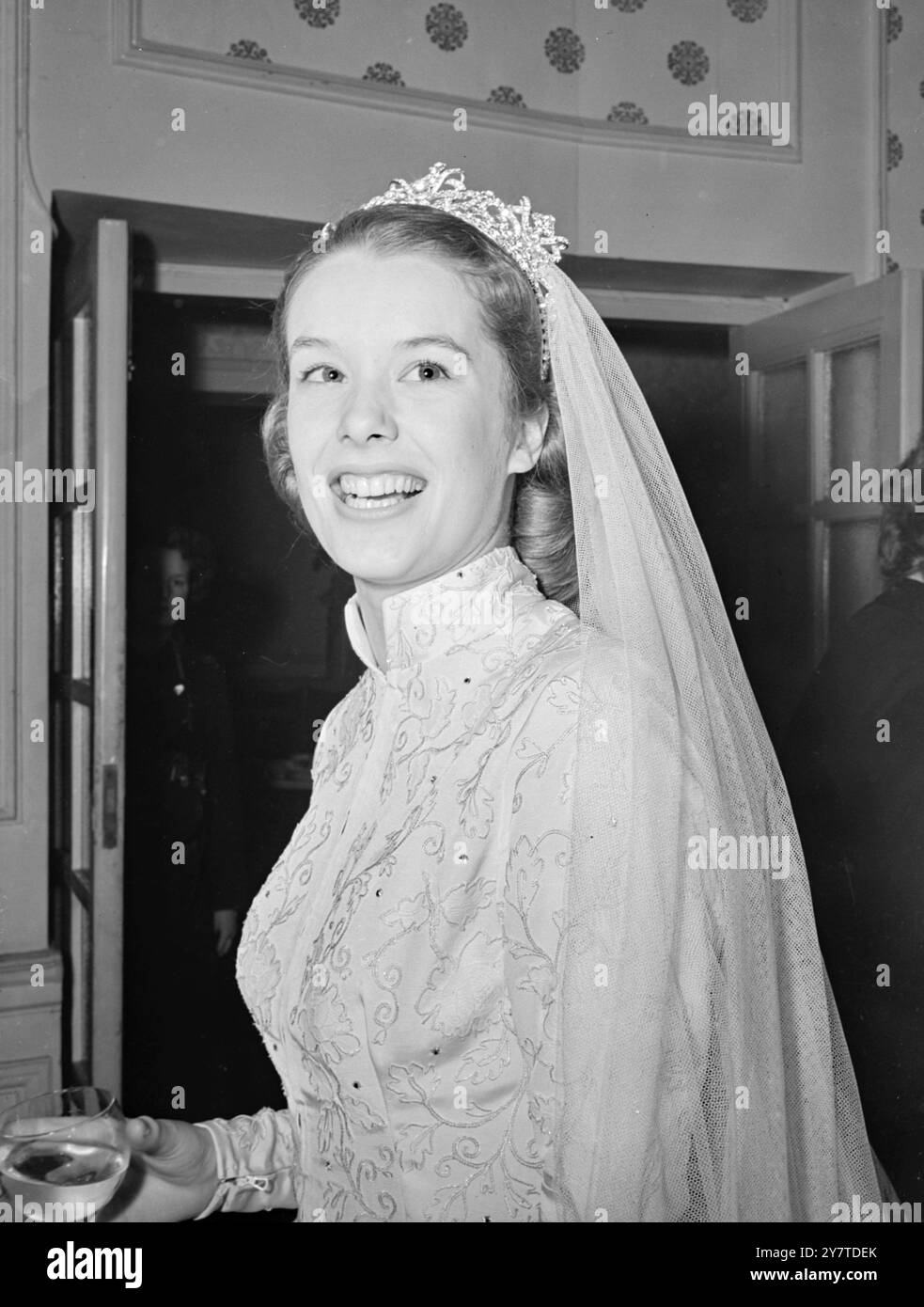 HAPPY BRIDE --PHOTOGRAPHED AT THE RECEPTION The smiling bride is the ...