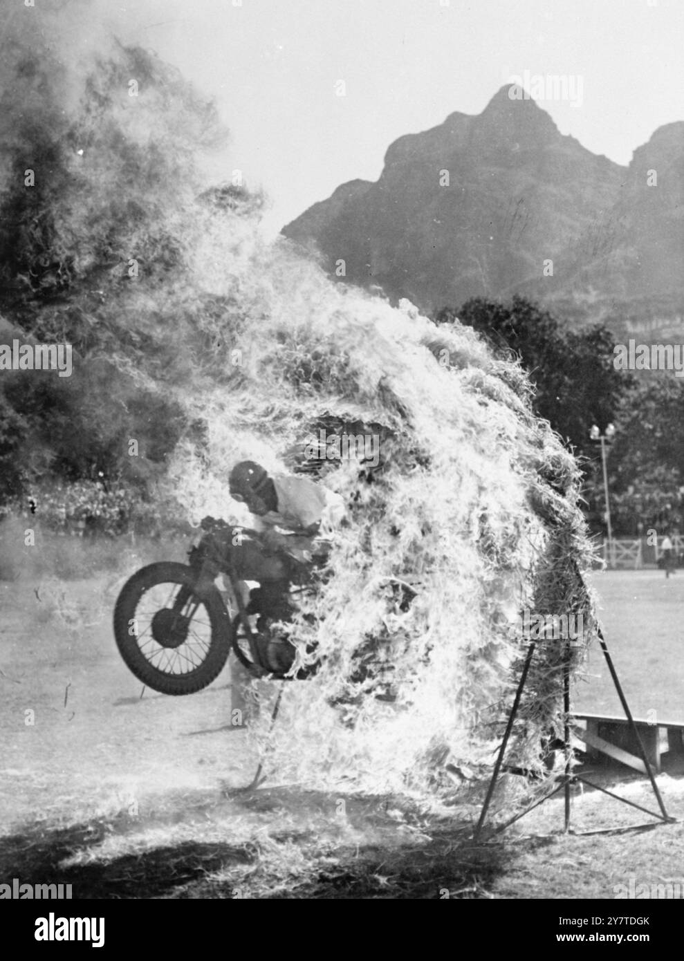 ' RED HOT ' AT HIS JOB A man neither fire nor flood can baulk is this ...