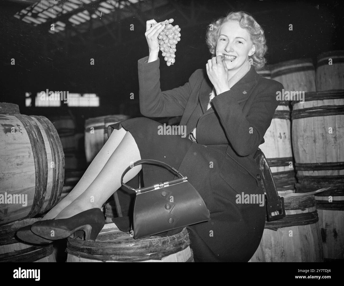 SOUTHAMPTON HAS FIRST FREE GRAPE AUCTION SINCE THE WAR . Thirteen ...