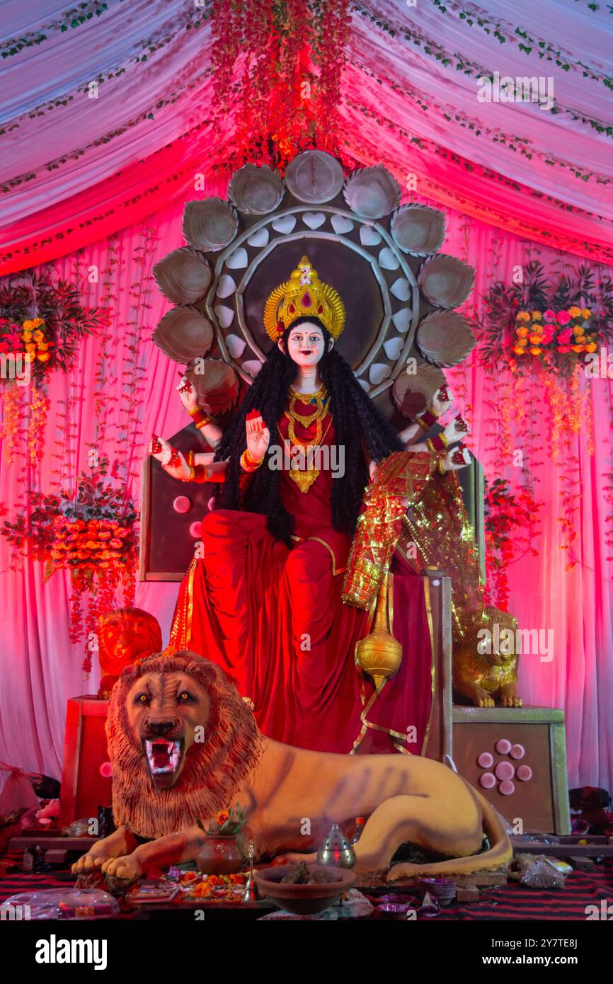 A beautiful idol of Maa Durga being worshipped at a pandal during ...