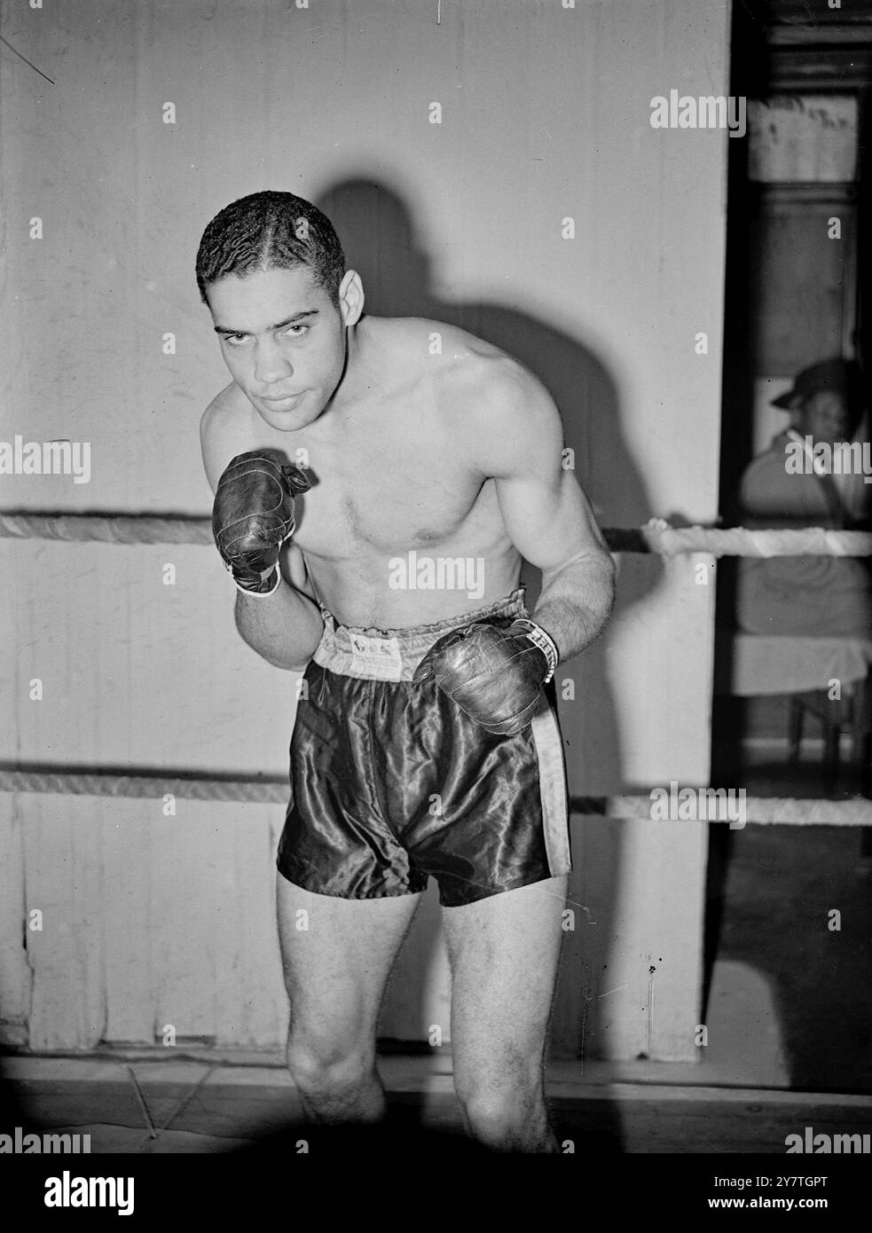 JET BOMBER OF THE BRITISH RING A handsome Canadian boxer who bears a ...