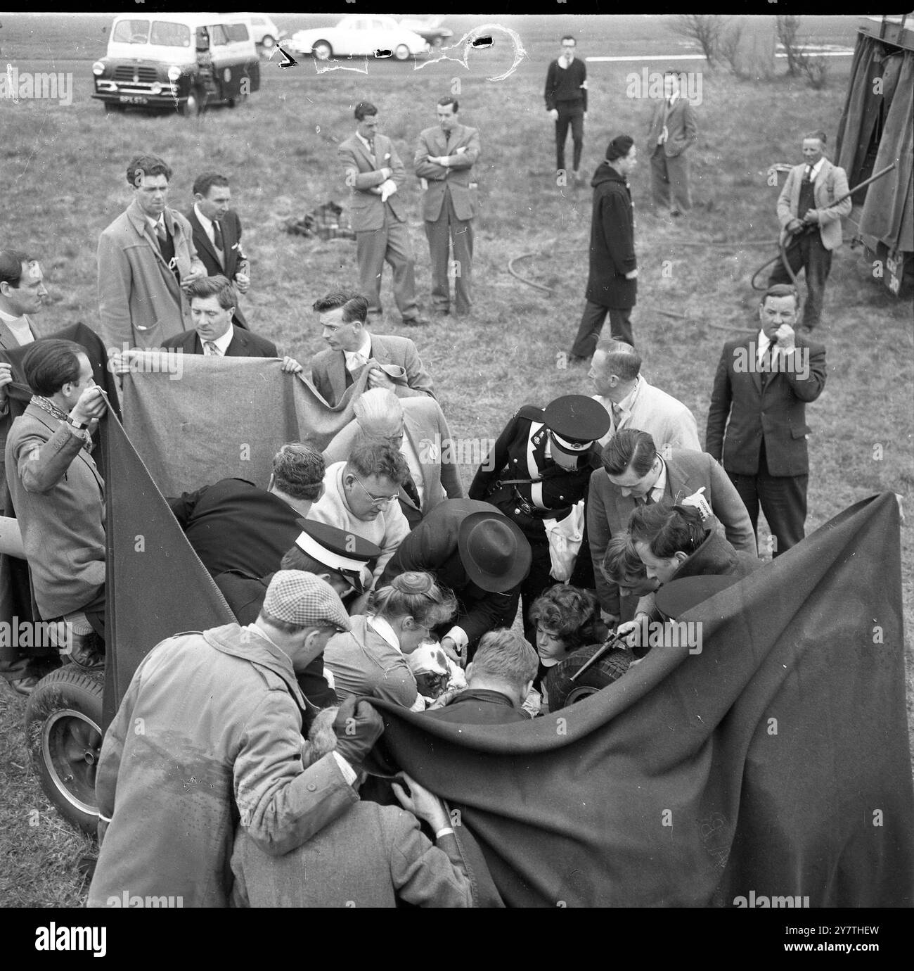 MOSS TRAPPED IN CRUMPLED CARGOODWOOD, SUSSEX: British racing driver ...