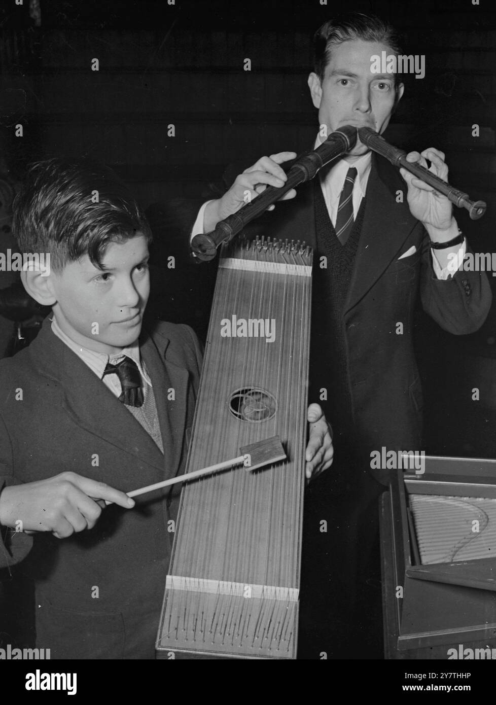 Music down the agesSeven-year-old Edward Stringer of Paddington happily ...