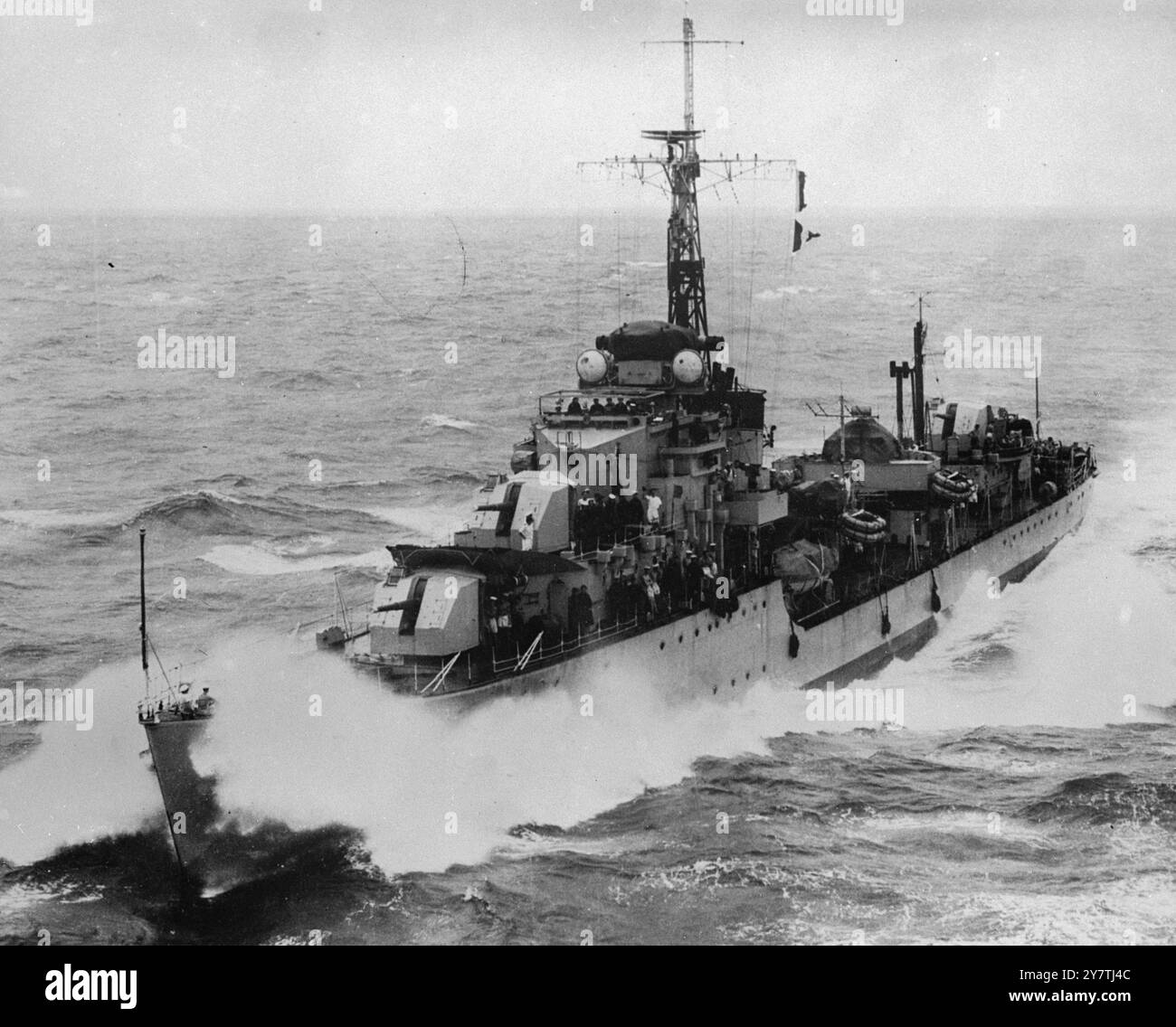 The British destroyer ' Cossack ' ( 1,710 tons) thrusts her bows ...
