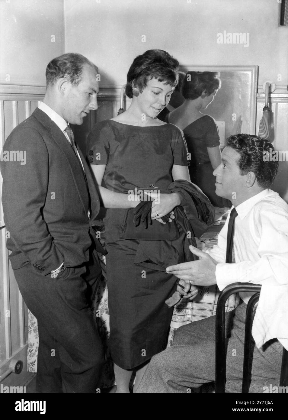 Stirling Moss, the famous racing driver, with his fiancee Katie Molson ...