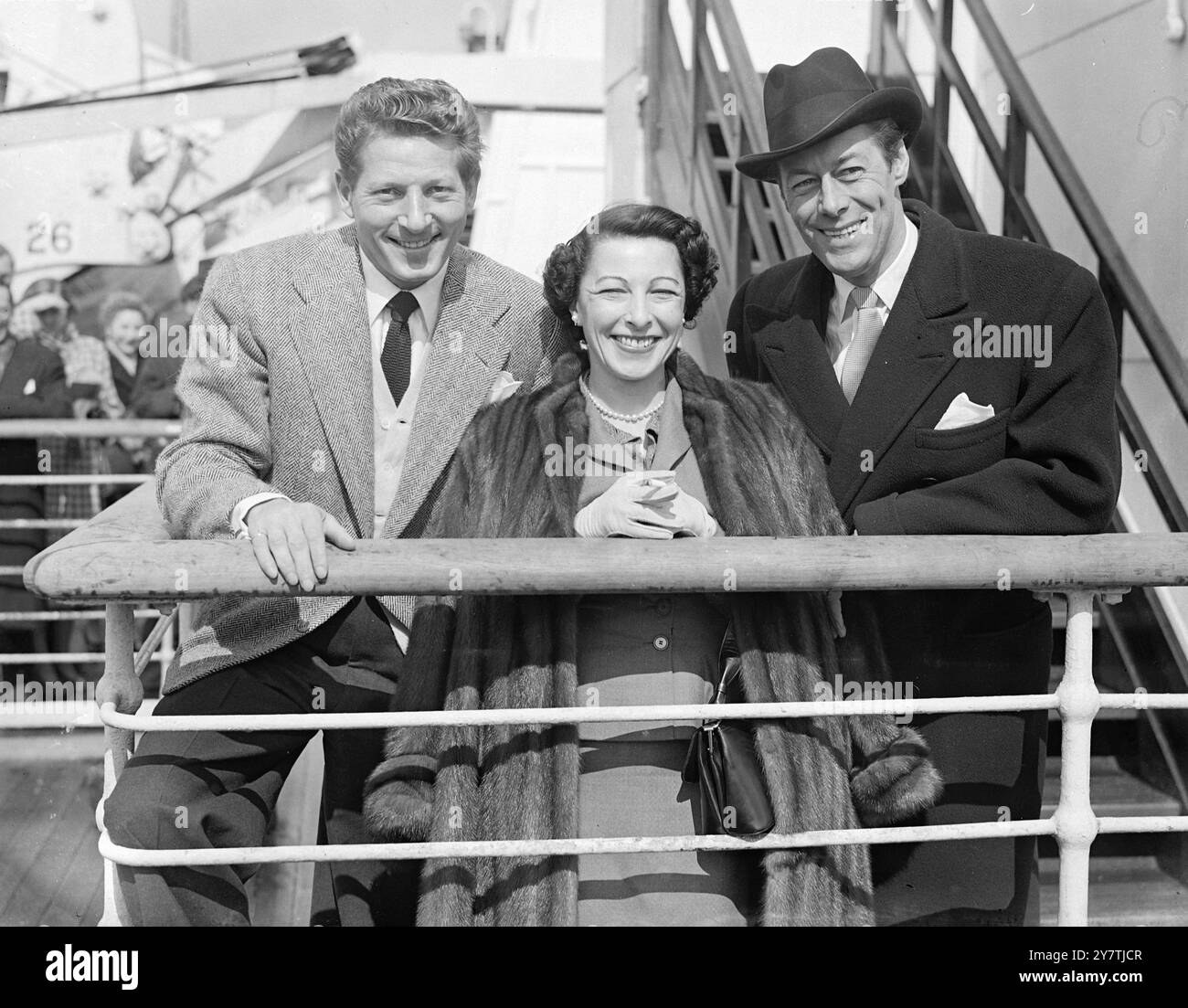 Southampton : Happy trio pictured aboard the liner Queen Elizabeth ...