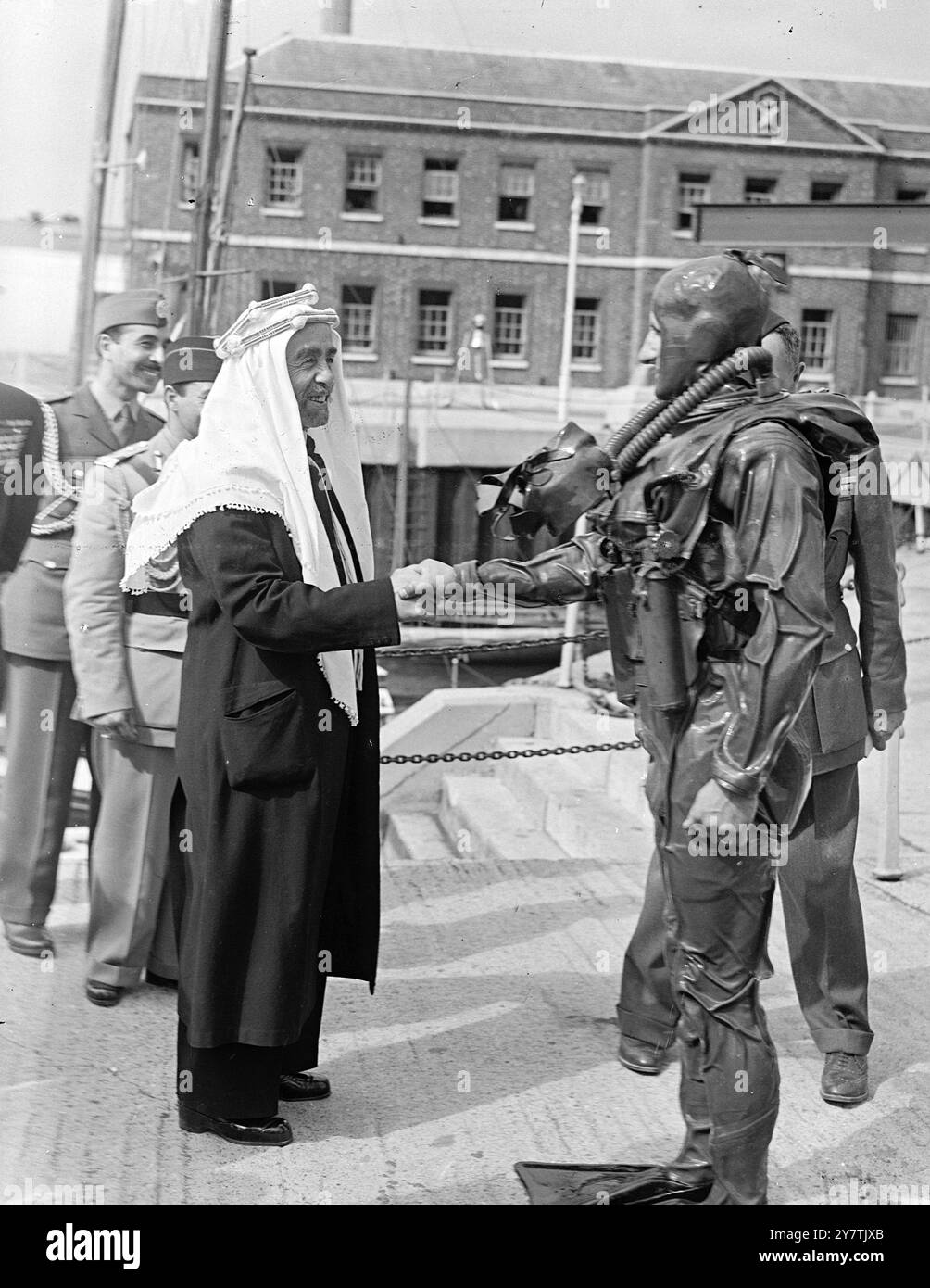 King Abdullah of Transjordan meets frogman during a visit to the ...