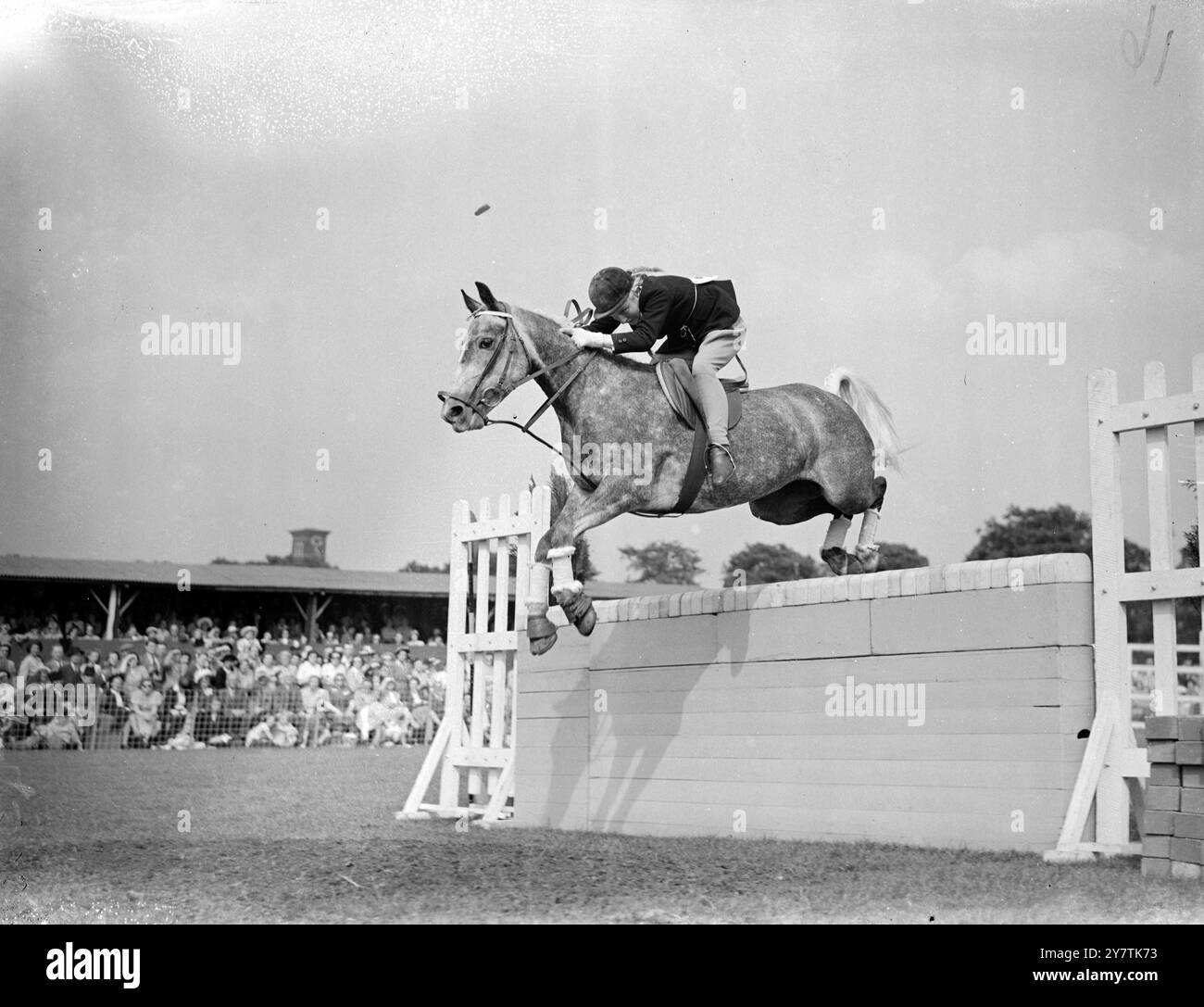 Anne Johnson , aged 13 , puts her head down and takes Blue Magic ...