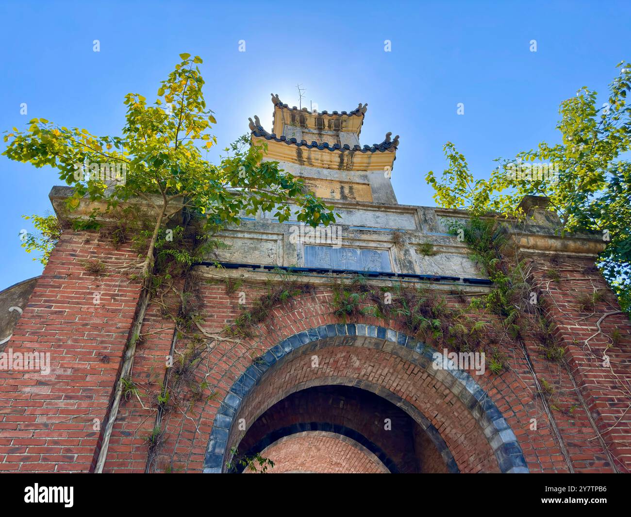 Quang Binh Quan. Ancient Asian Gateway Stands Tall Against the Blue Sky ...
