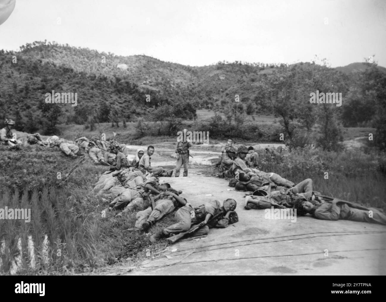 A SLEEP ON THE RETREATSomewhere in Korea: Battle weary soldiers of the ...