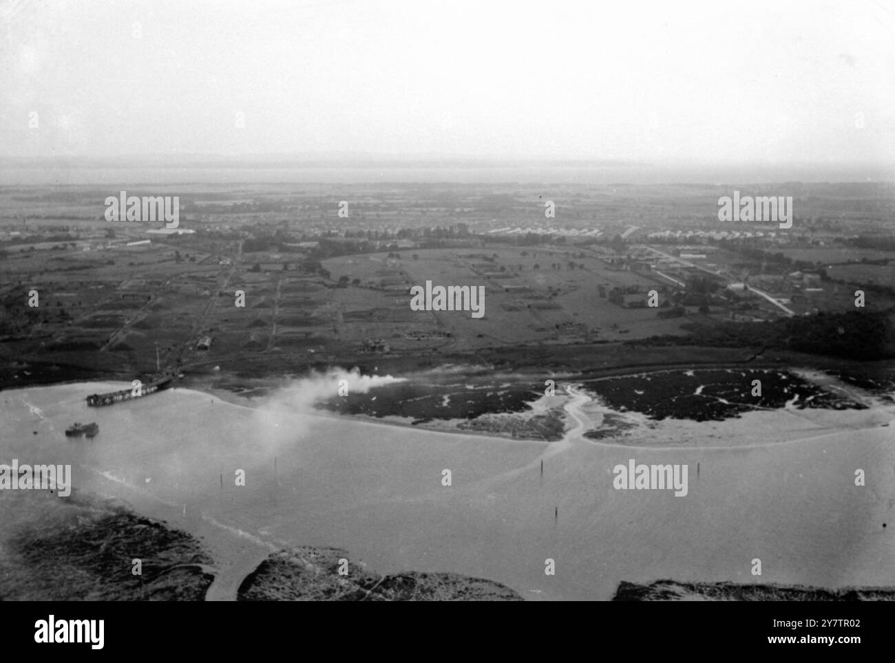 BARGES SINK, TRAIN HURLED INTO WATER, AS DOUBLE EXPLOSION ROCKS ...