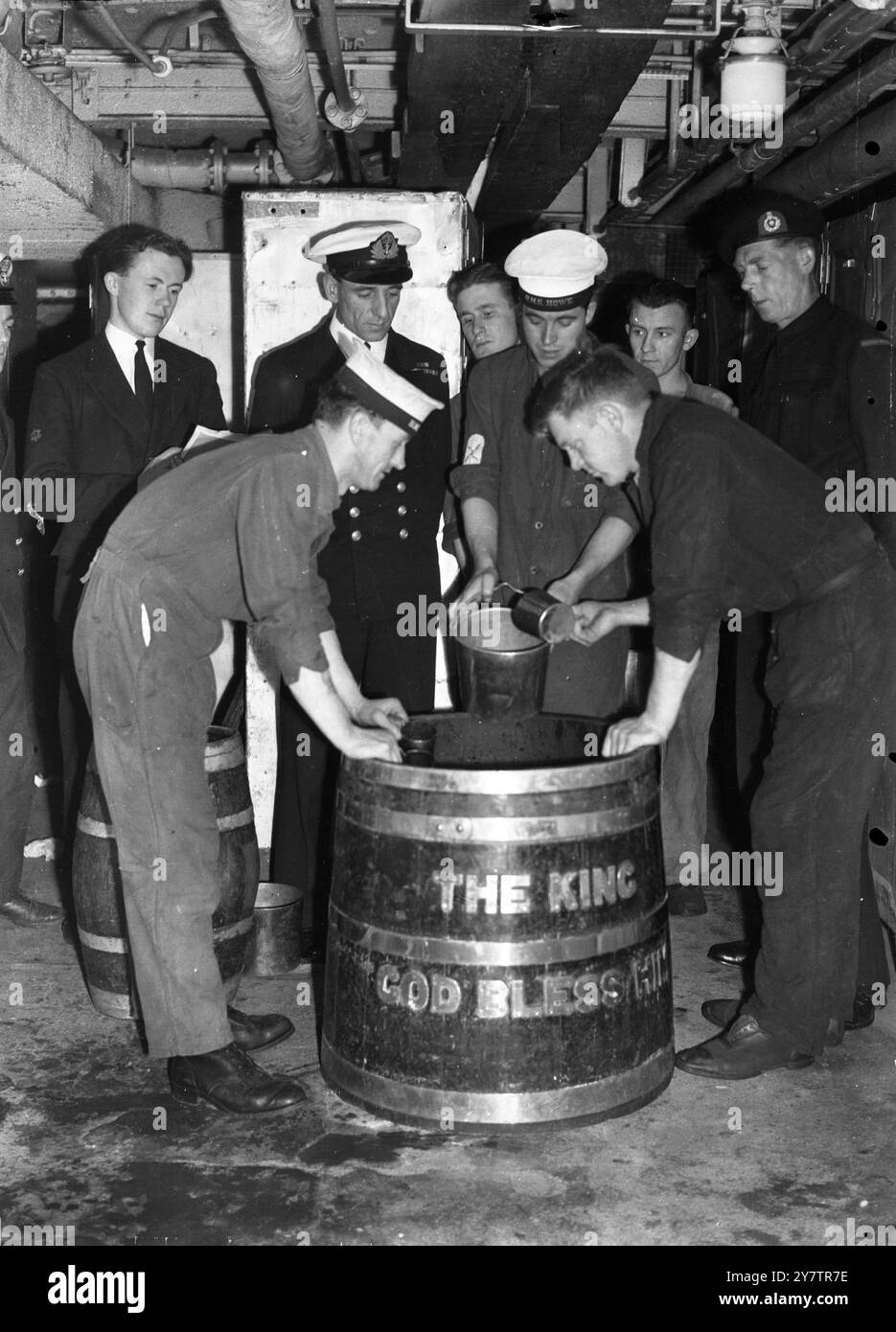 RUM RATION ABOARD HMS HOWE - Sailors aboard ship sharing out the daily ...