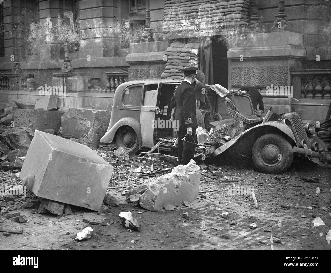 AIR RAID DAMAGE AT THE FAMOUS CARLTON CLUB Photo Shows: Blocks of ...