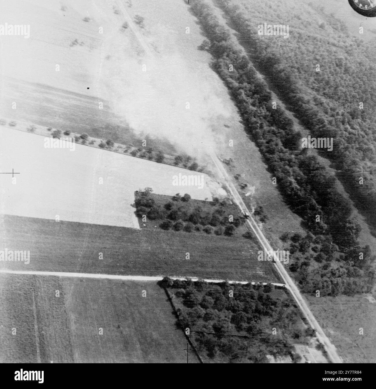 The incendiary bombs dropping among and dispersing mechanical transport ...