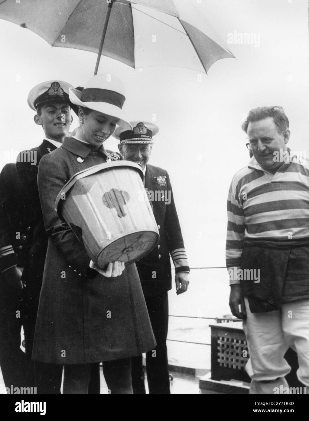 HRH Princess Anne looks into the giant shaker before making a throw for ...
