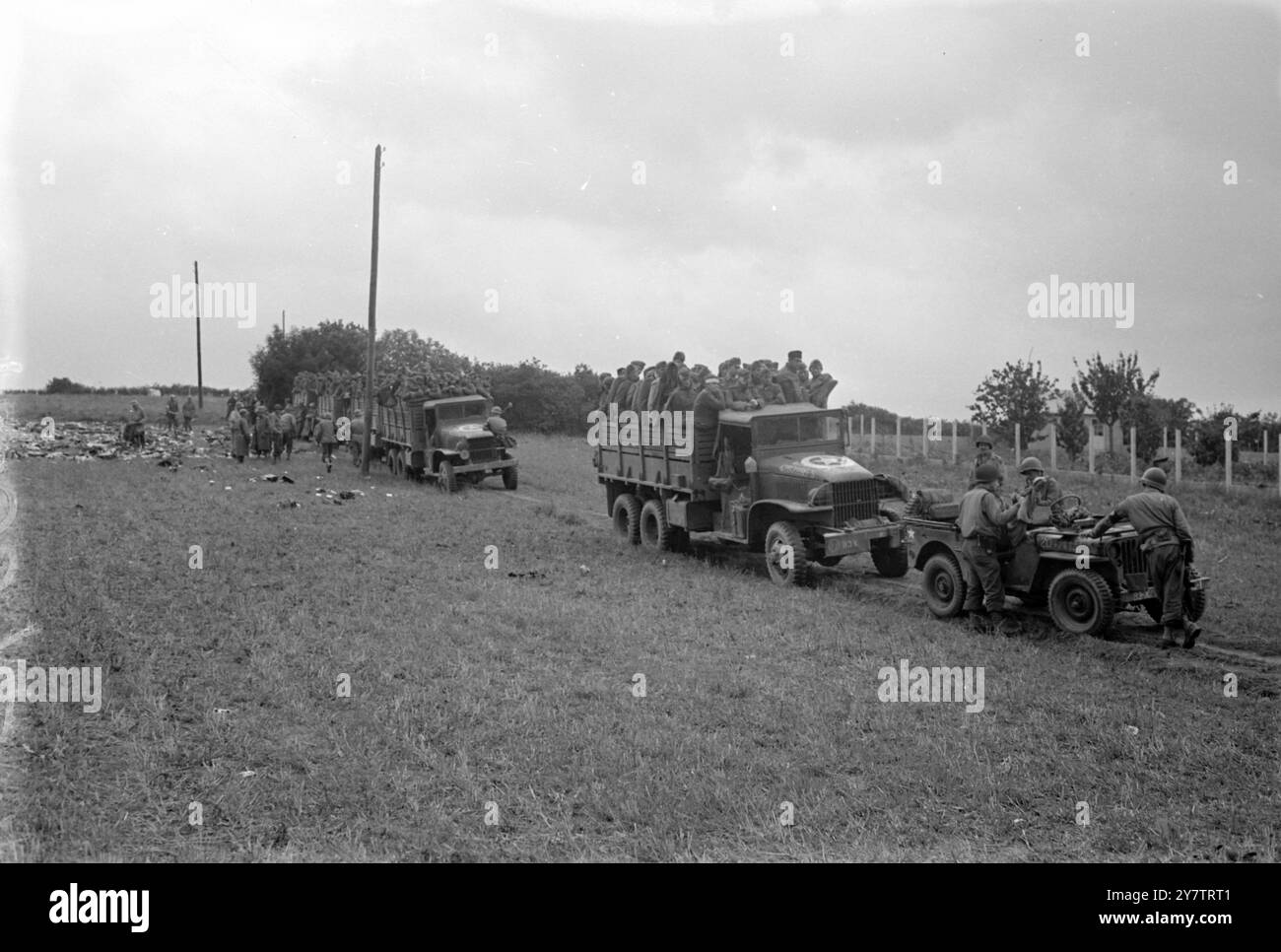 Prisoners are loaded into trucks after the capture of Cezembre ...