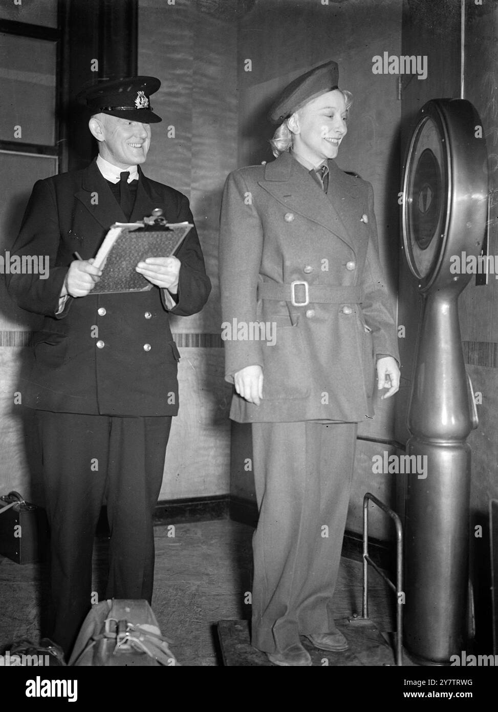 FRANCES DAY Gets weighed in before flying to Burma Stock Photo - Alamy
