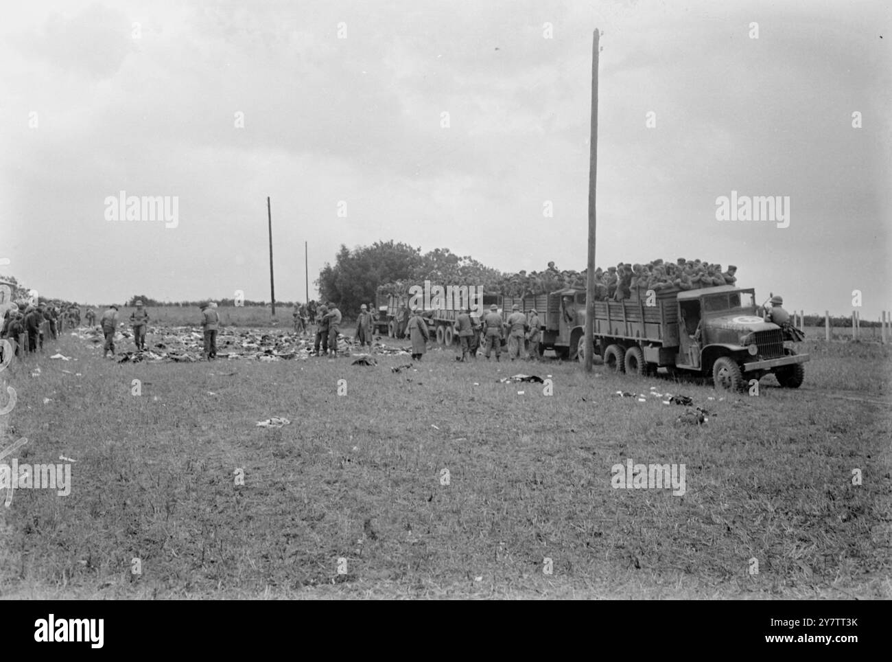 Prisoners are loaded into trucks after the capture of Cezembre ...