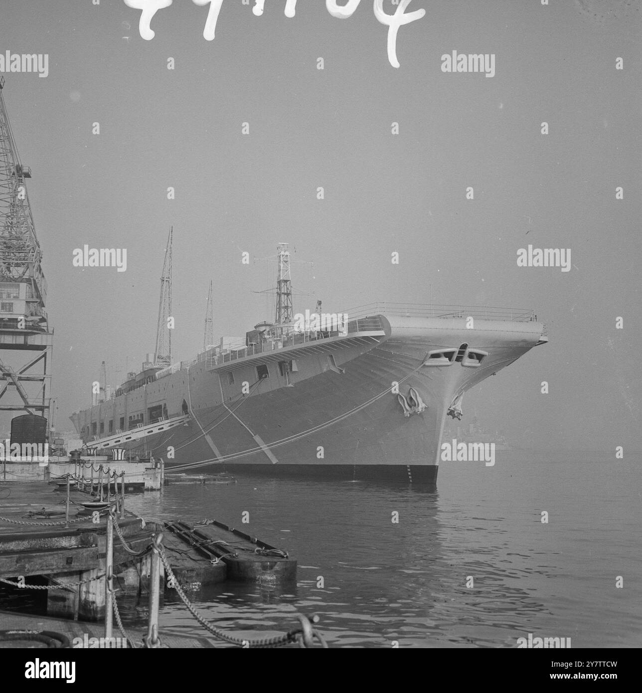 Former aircraft carrier , HMS Triumph , at a dockyard in Portsmouth ...