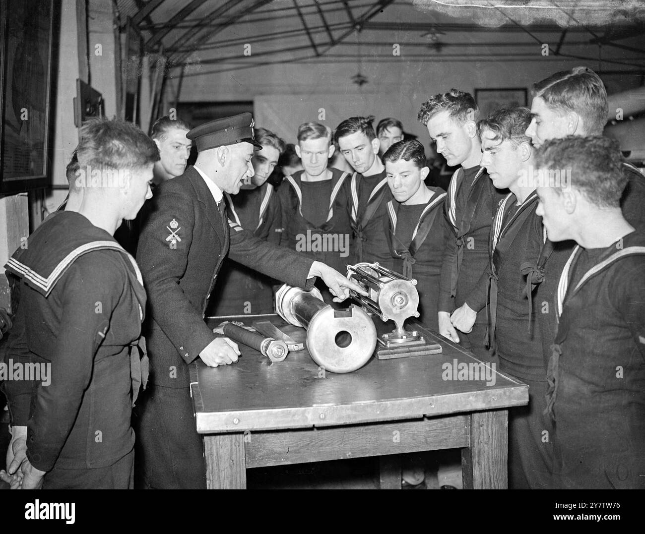 Photo Shows: Gun crews during naval gunnery training at a Royal Marines ...