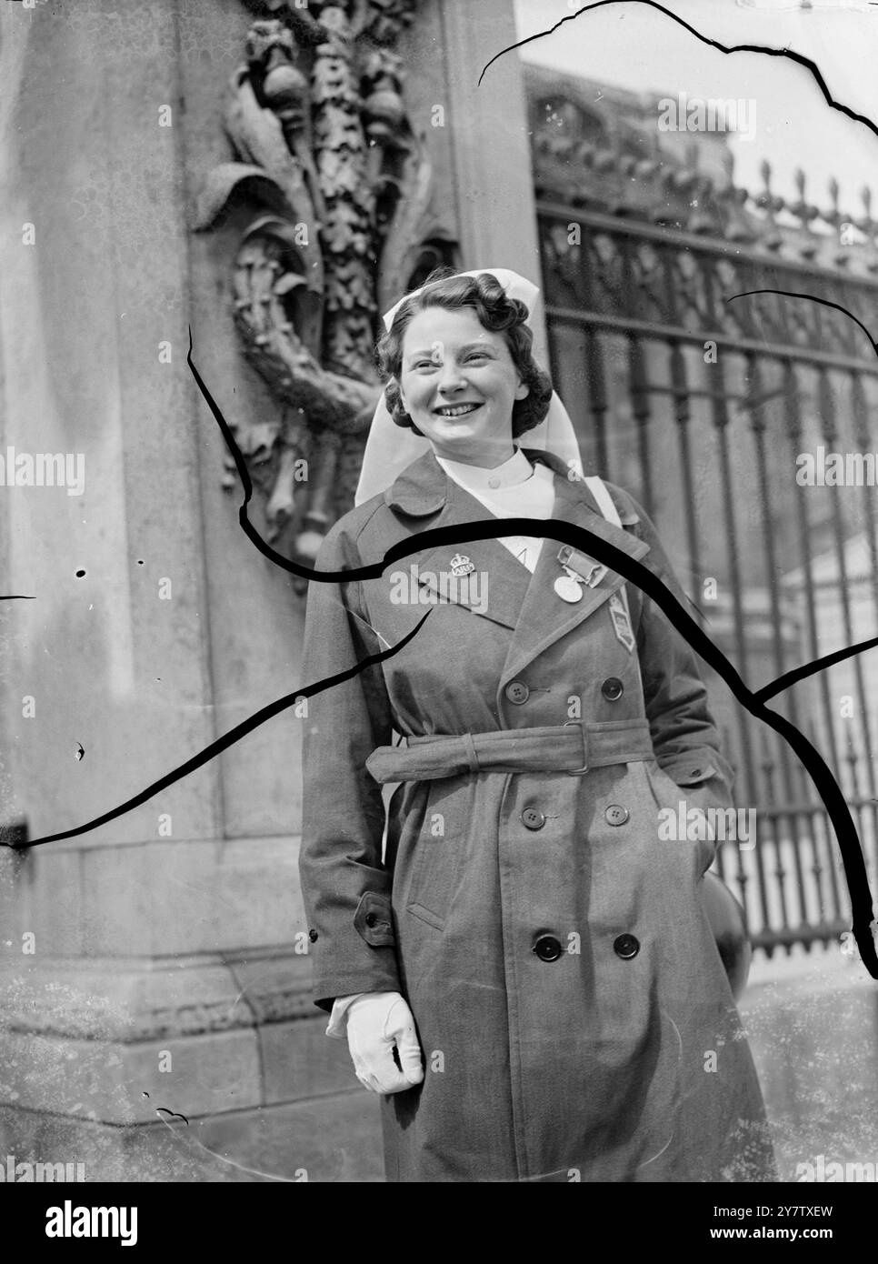 IRISH NURSE DECORATED AT PALACE INVESTITURE Photo Shows: Sister Denise ...