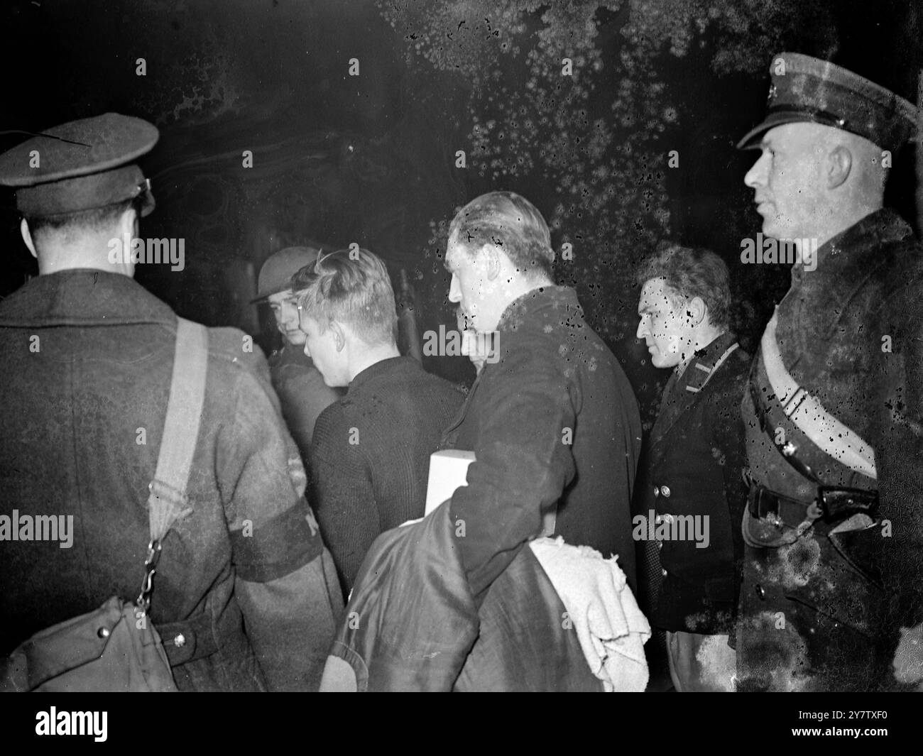 THE WAR IS OVER FOR THIS GERMAN Photo Shows: A German prisoner passing ...